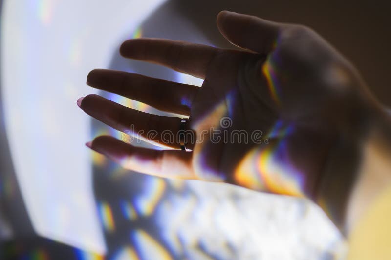 A Hand is Being Pressed with a Light by a Circular Glass Window Stock ...