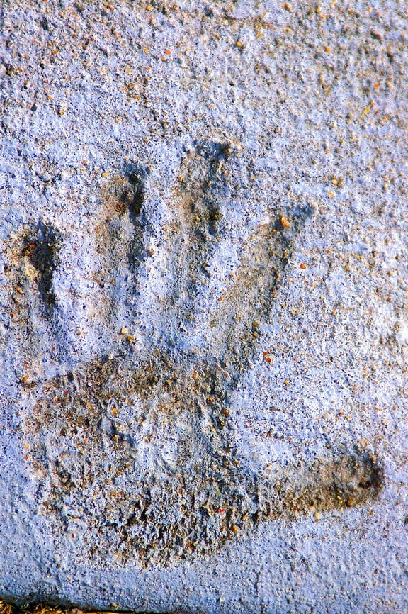Hand impression stock image. Image of palm, blue, grit - 596799