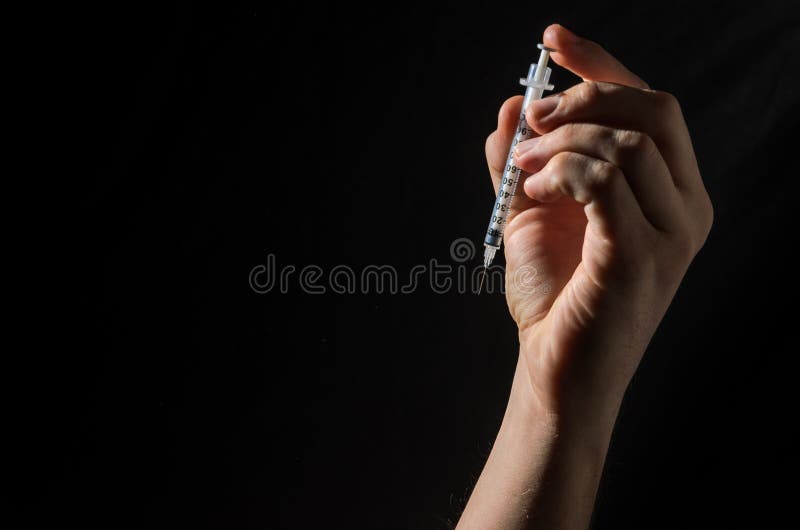 Hand with Injection Syringe on Black Background Stock Photo - Image of ...