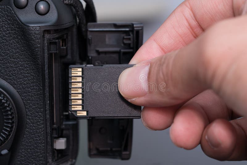 Hand Insert SD Card in Camera Stock Photo - Image of camera, save ...