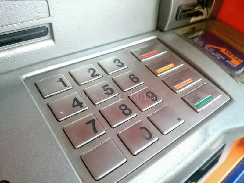 Hand Inserting ATM Card into Bank Machine To Withdraw Money Stock Photo ...