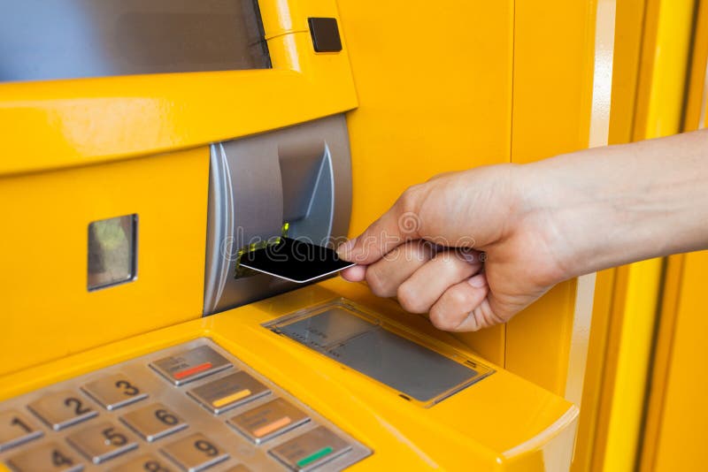 ATM. Inserting a Card. stock photo. Image of card, charge - 1415110