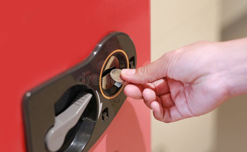 Hand Inserting Coin into Vending Machine Stock Image - Image of ...