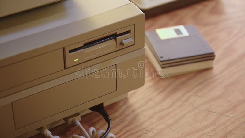 Hand Inserting and Ejecting Floppy Disk into Vintage Commodore Amiga ...
