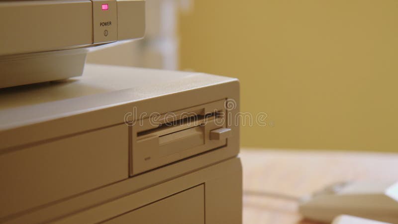 Hand Inserting and Ejecting Floppy Disk into Vintage Commodore Amiga ...