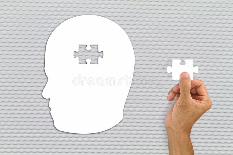 Hand Inserting Missing Brain Jigsaw in White Man`s Head Shape Stock ...