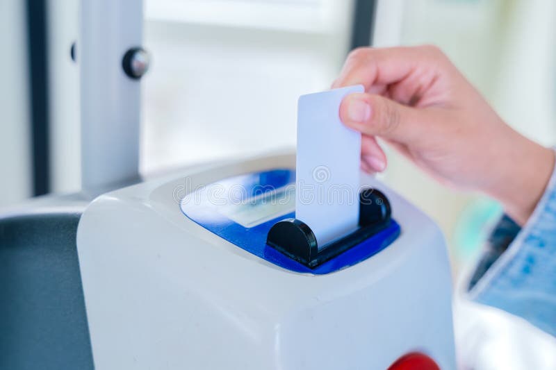 Hand Inserting Ticket into Validation Machine on Public Transport Stock ...