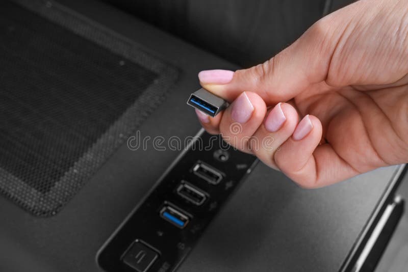 Hand Inserting USB Flash Memory Drive Plugged into a Computer Port. USB ...