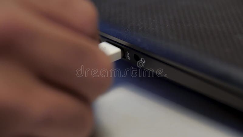 Hand Inserting White USB Cable into Laptop Isolated on White Background ...