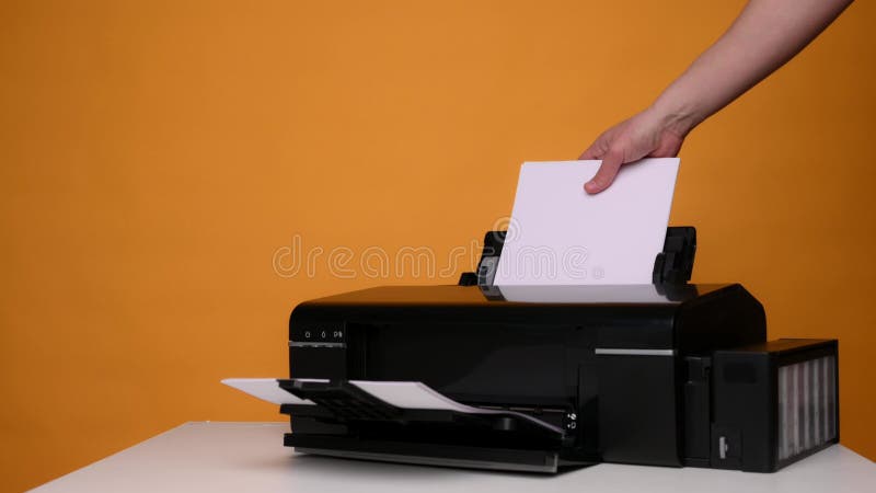 Photo Printer and Blank Sheets of Photo Paper are Inserted into the ...