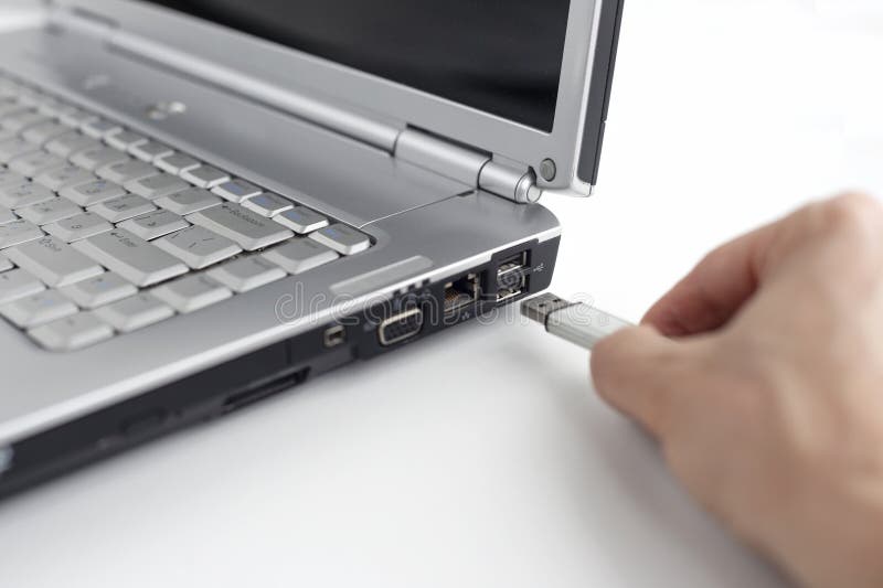 Hand Inserts Flash Drive into Laptop USB Port Stock Photo - Image of ...