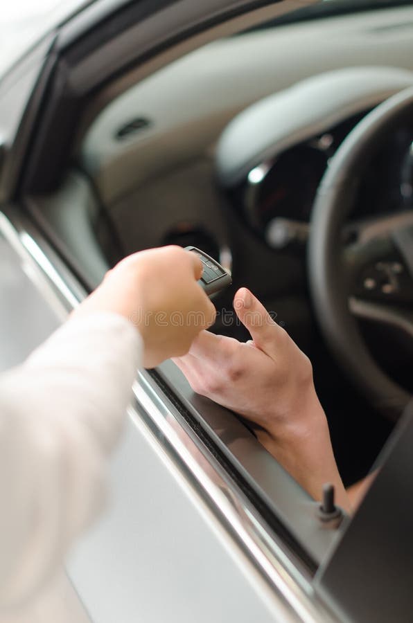 Female Hand Inside Car Getting Keys Stock Photos - Free & Royalty-Free ...