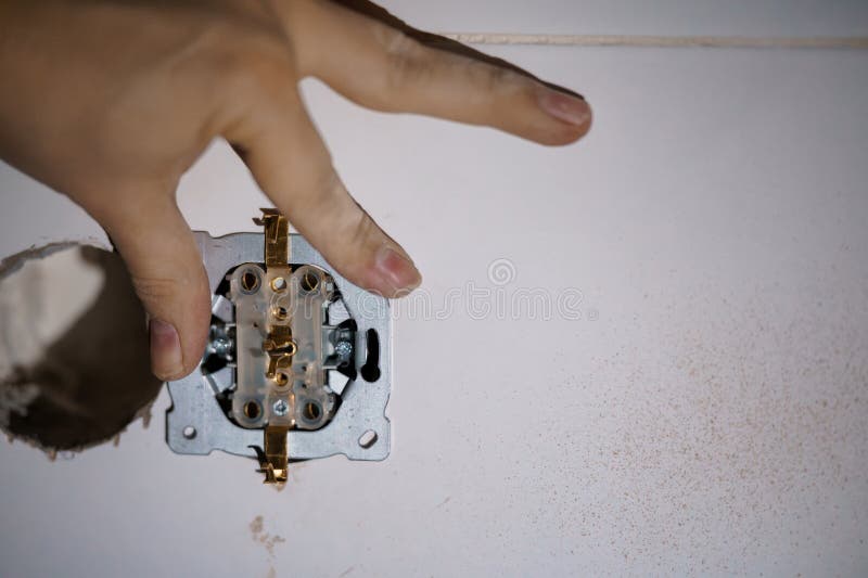 Hand Installing Electrical Outlet in Wall Stock Photo - Image of ...