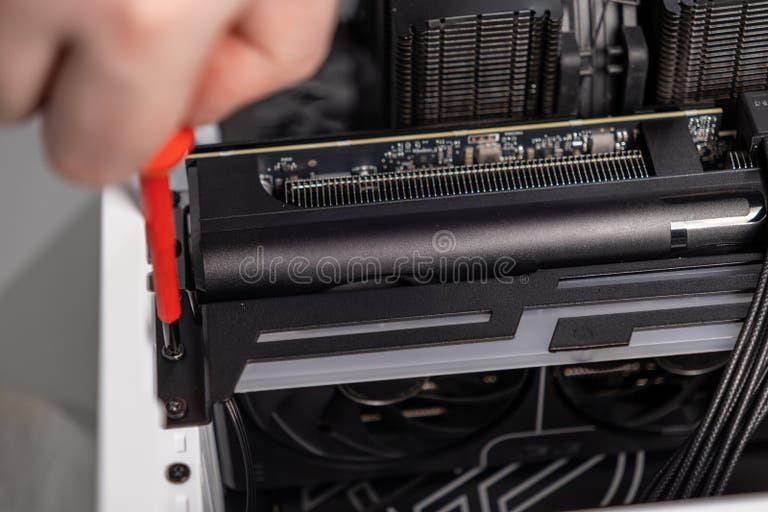 Hand Installing Modern GPU into PCIe Slot Inside Desktop Computer Case ...