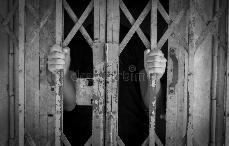 Hand in jail stock photo. Image of adult, lock, dark - 50317908