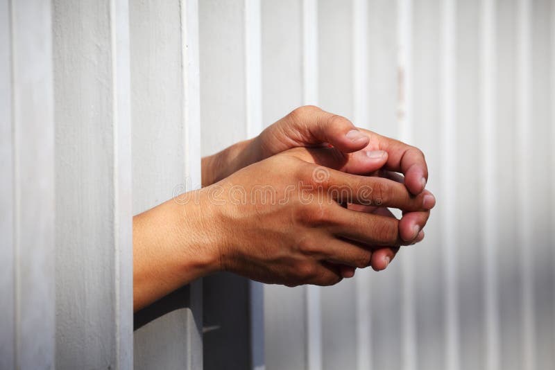 Hand in Jail stock photo. Image of detention, crime, arrest - 60521632