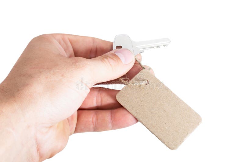 A hand with key and stock image. Image of house, open - 104491657