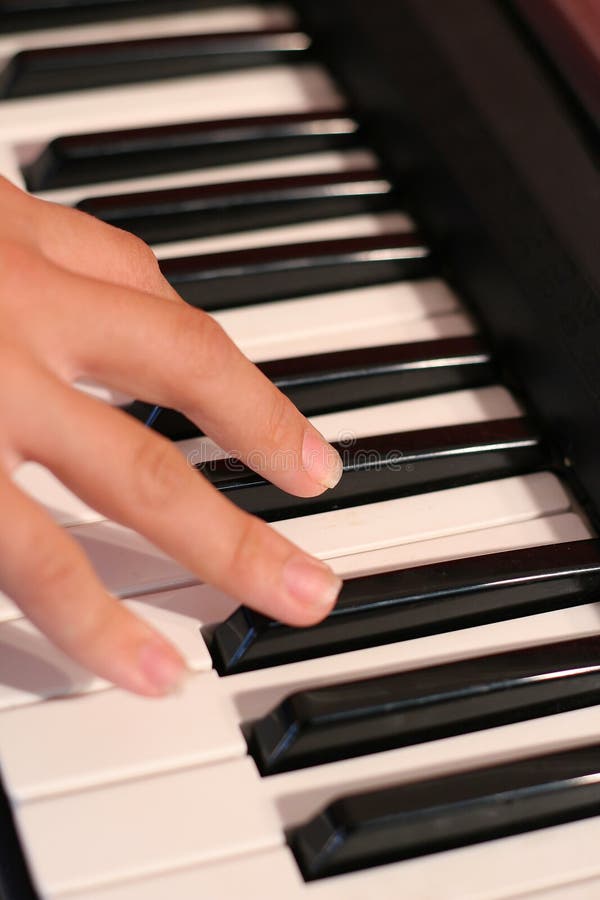 Hand on keyboard stock image. Image of instrument, keyboard - 2180587
