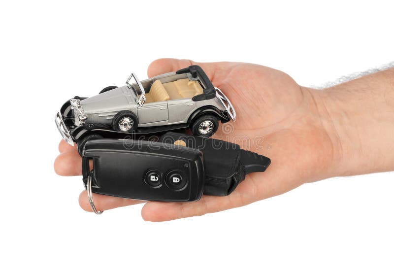 Hand with keys and car stock photo. Image of black, lock - 66800652