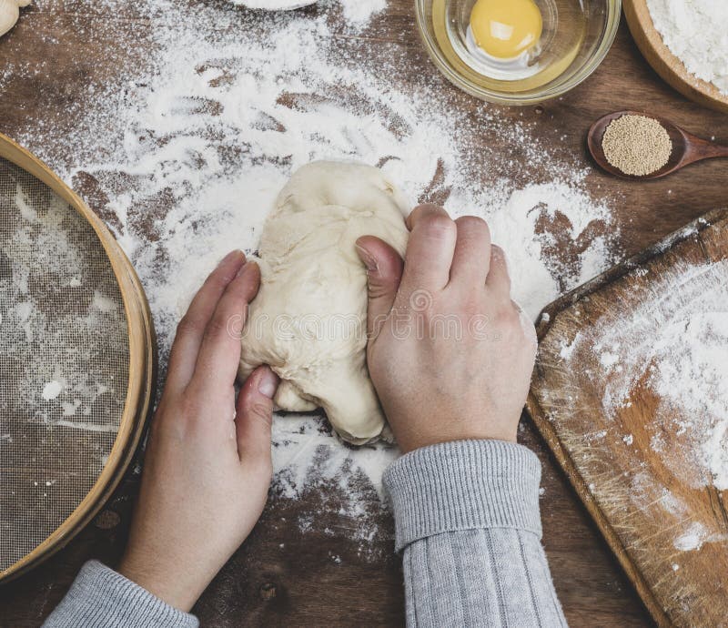 Hand Kneaded Dough on Brown Wooden Table Stock Photo - Image of prepare ...