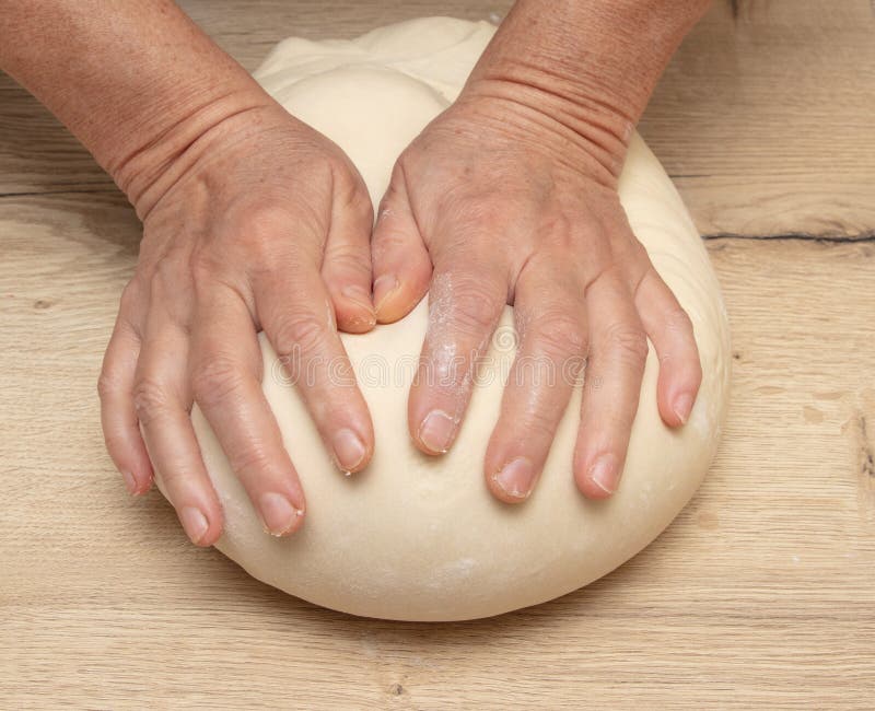 Hand kneading flour dough. stock image. Image of bakery - 267130493