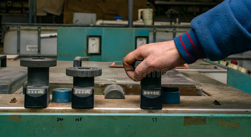 Hand on the Knob for Adjusting the Industrial Machine Stock Image ...