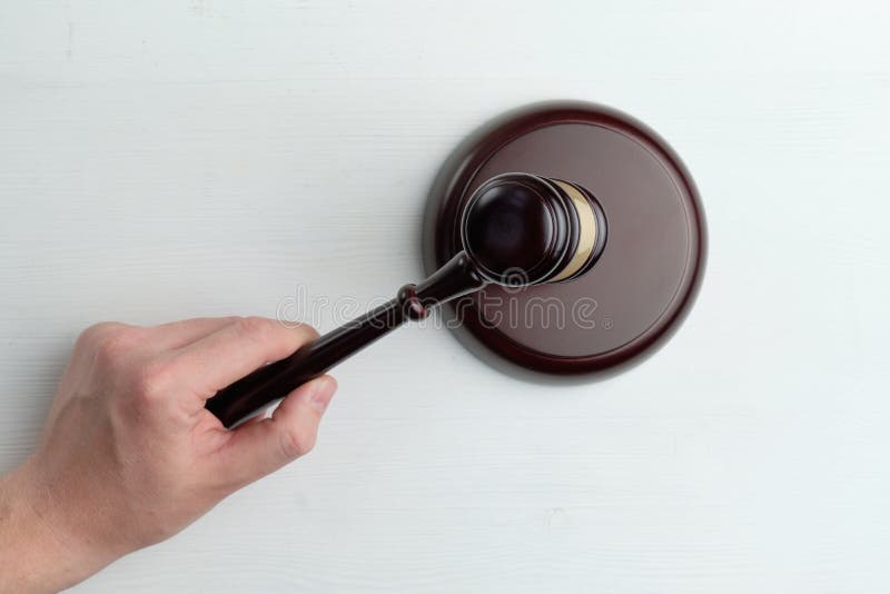 Hand Knocking the Table with a Judge Hammer Stock Image - Image of ...