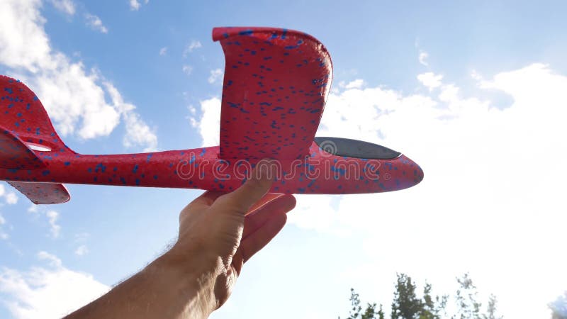 The Hand Launch the Plane on the Background of a Blue Sky Stock Video ...