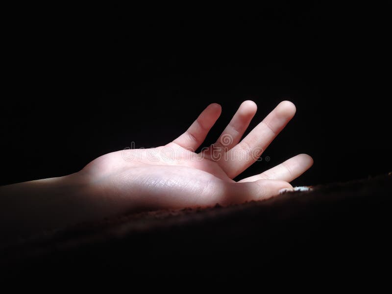 Hand laying in the dark stock photo. Image of finger - 247161876