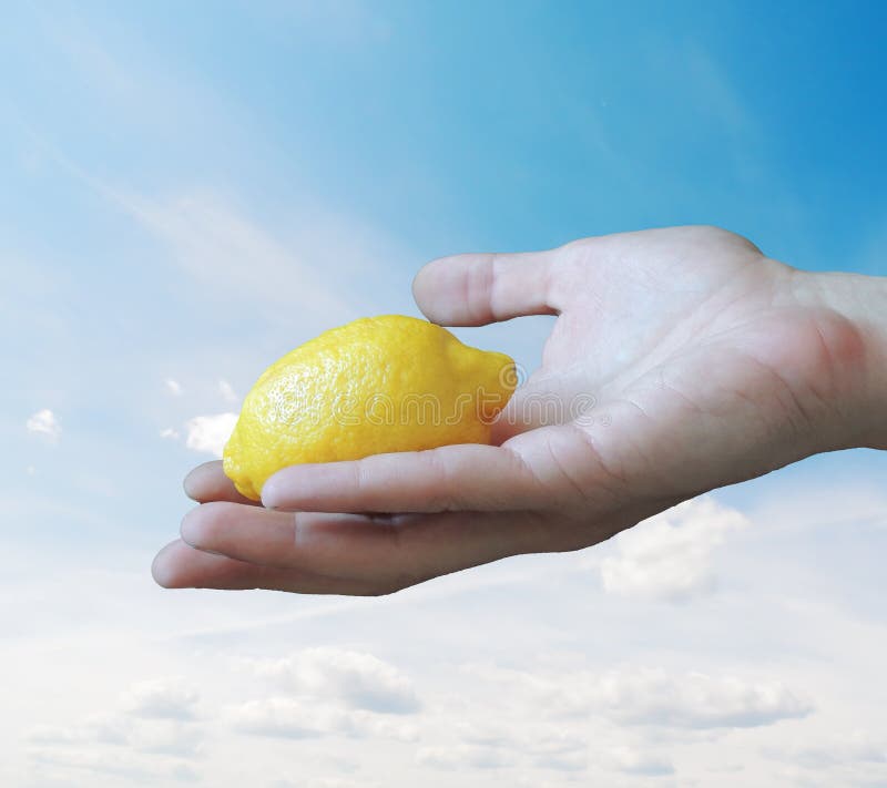 The hand with lemon stock photo. Image of ingredient - 32260626
