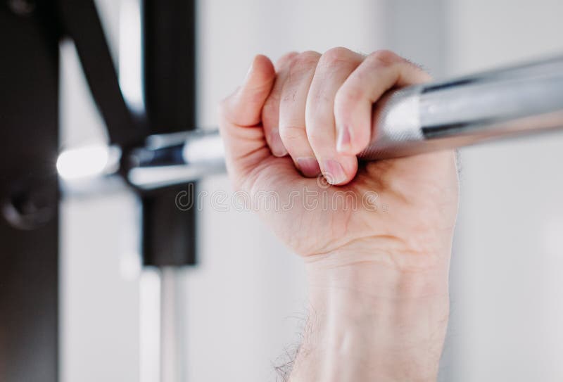 Hand Lifting Weights on a Barbell Stock Image - Image of functional ...
