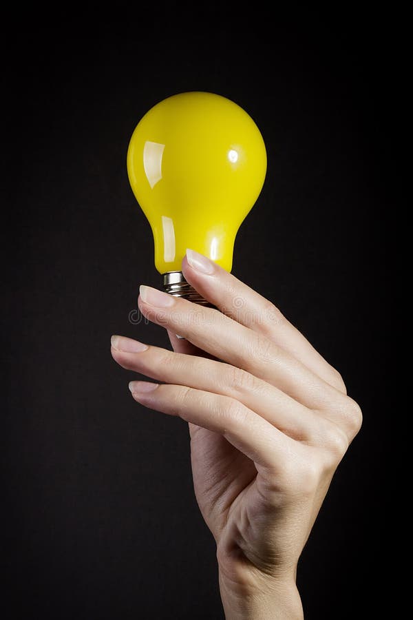 Hand with light bulb stock image. Image of generation - 154133607