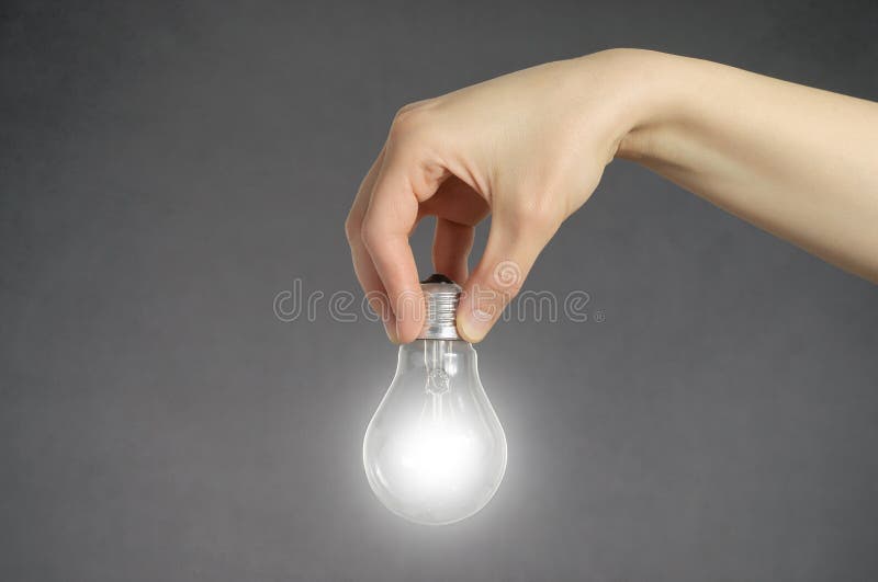Hand with light bulb stock photo. Image of ecology, industry - 29992562