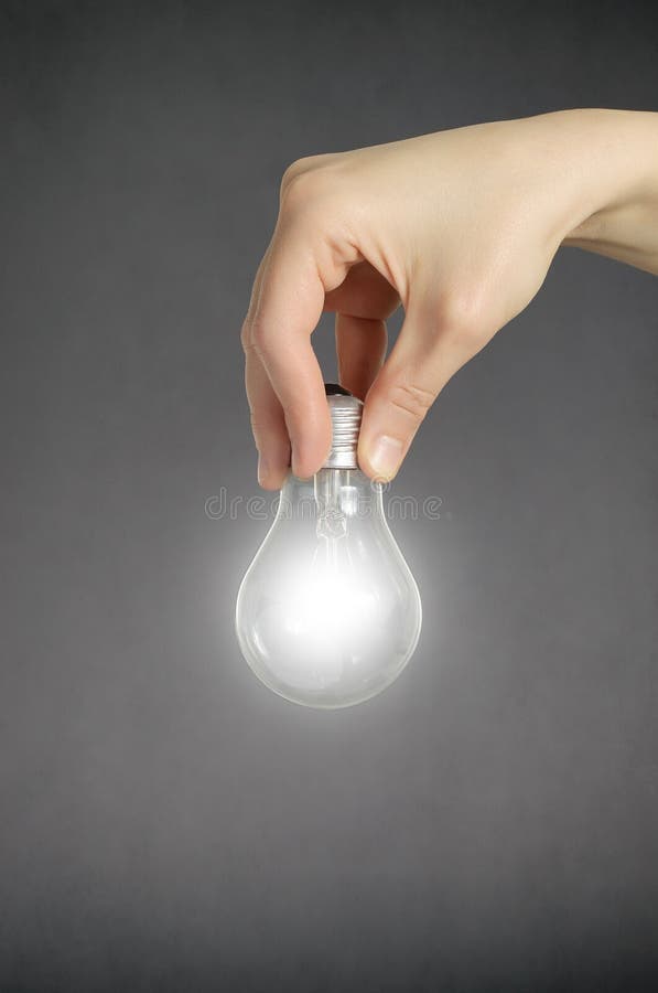 Hand with light bulb stock photo. Image of ecology, industry - 29992562
