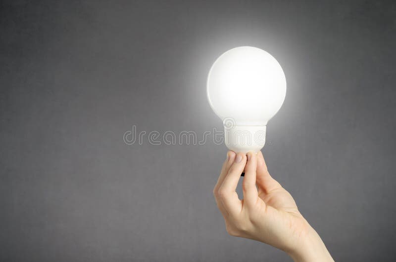 Hand with light bulb stock photo. Image of ecology, industry - 29992562