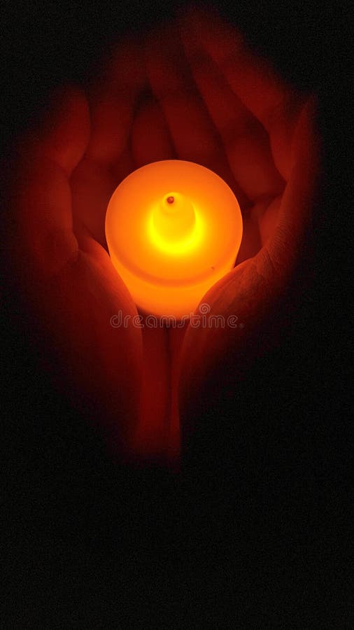 Hand of light stock image. Image of yellow, light, flame - 266186277