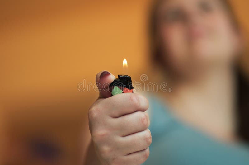 Hand with lighter stock photo. Image of heat, human - 128047256