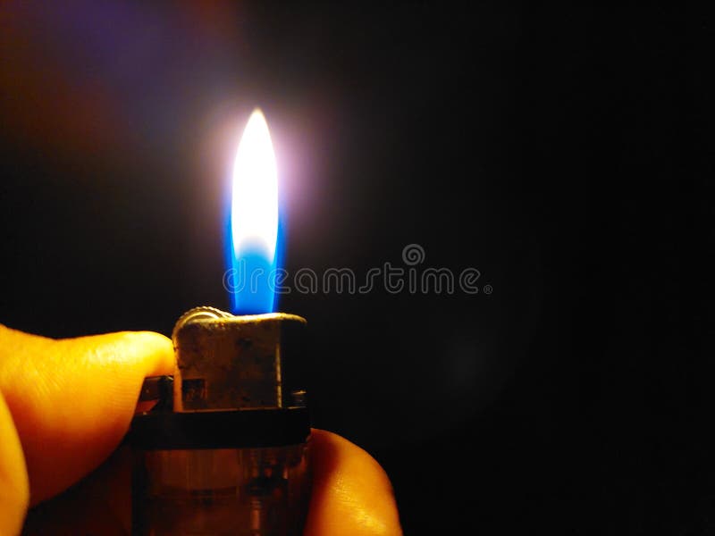 The Hand that Lights the Match for the Night Light Stock Photo - Image ...