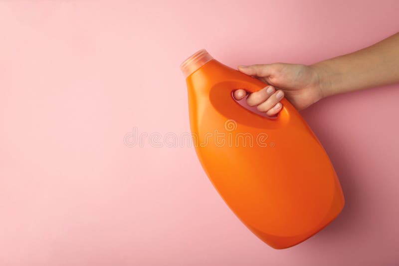 Hand with Liquid Laundry Detergent Bottle, Cleaning Soap for Cloth on ...