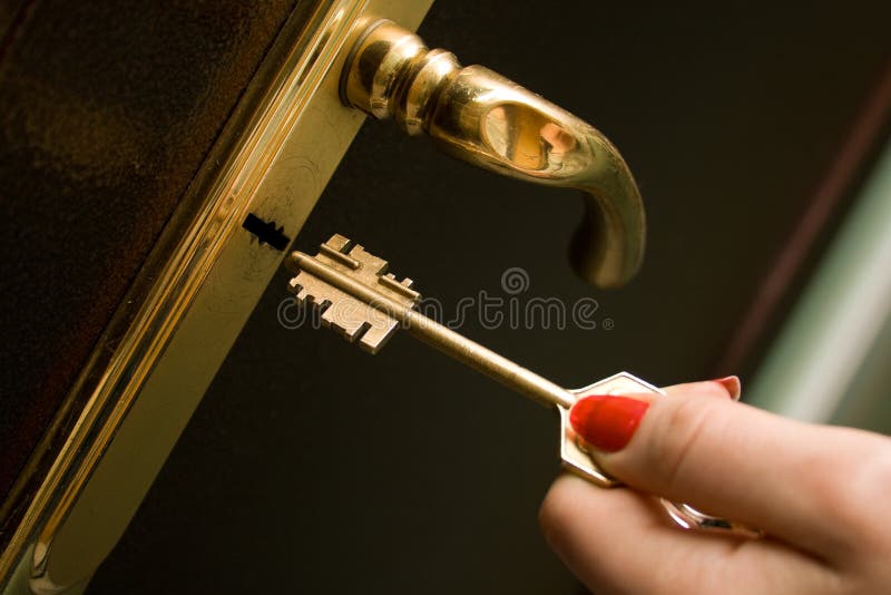 Hand, Locking a Key an Iron Door Stock Photo - Image of lock, hand: 5881064