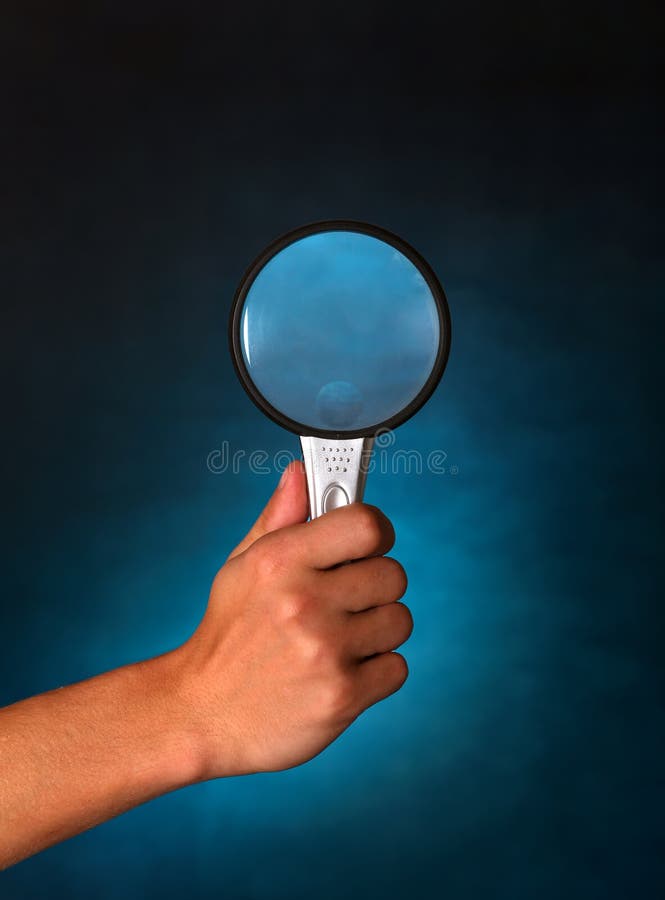 Hand of Man with Loupe and Sheet of Paper on Blue Surface, Top View ...