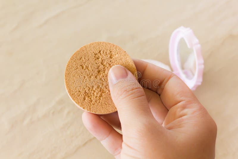 Hand and Low Quality Useless Powder Puff Stock Photo - Image of quality ...