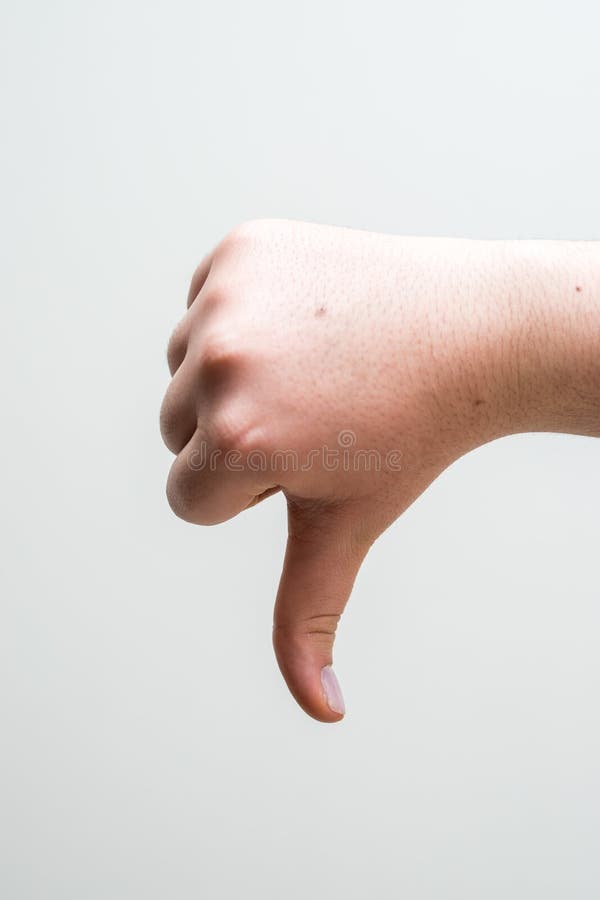 Hand lowering the thumb stock image. Image of fingernail - 225778191