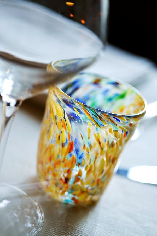 Hand-made Glass of Colored Glass on a Set Table Stock Image - Image of ...