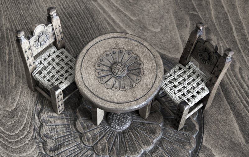 Hand Made Miniatures Chairs on Beautiful Carved Table Stock Image ...