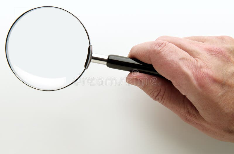 HAND WITH MAGNIFYING GLASS stock image. Image of hand - 1353935