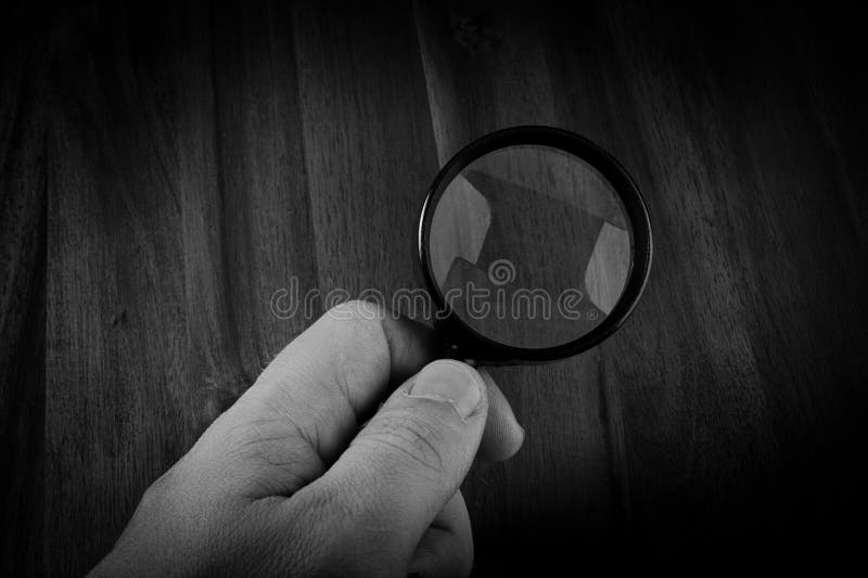 Hand and magnifying glass stock photo. Image of business - 99570718