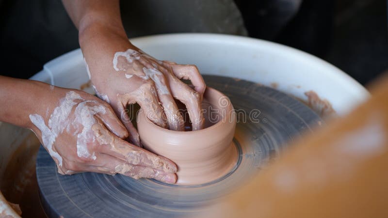 Hand Making Clay Pottery at Throwing Wheel. Stock Photo - Image of ...