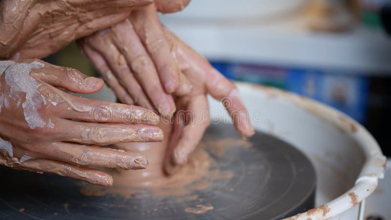 Hand Making Clay Pottery at Throwing Wheel. Stock Image - Image of ...