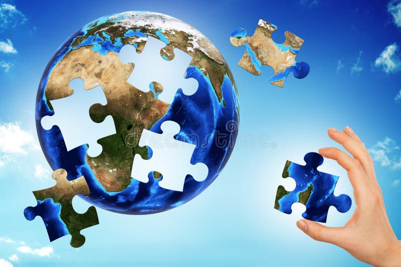 Hand making earth puzzle stock image. Image of hand, person - 67314075